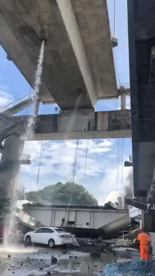 Taiwan bridge collapse crushes fishing boats, six crew feared trapped