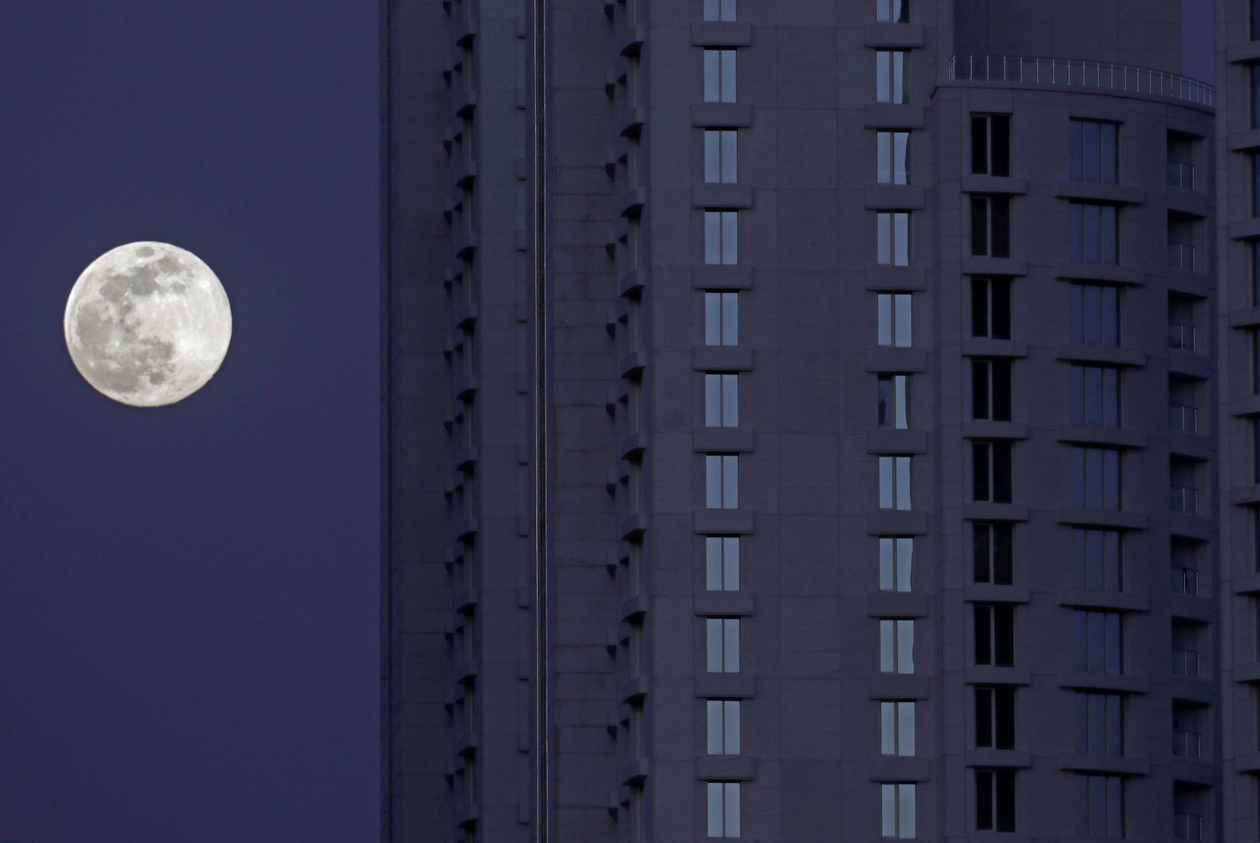 Photos: Largest supermoon of 2020 rises on a world battling COVID-19