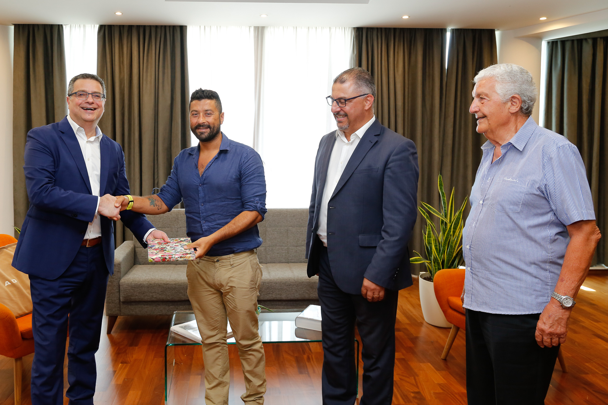 Watch: Opposition leader congratulates swimmer Neil Agius
