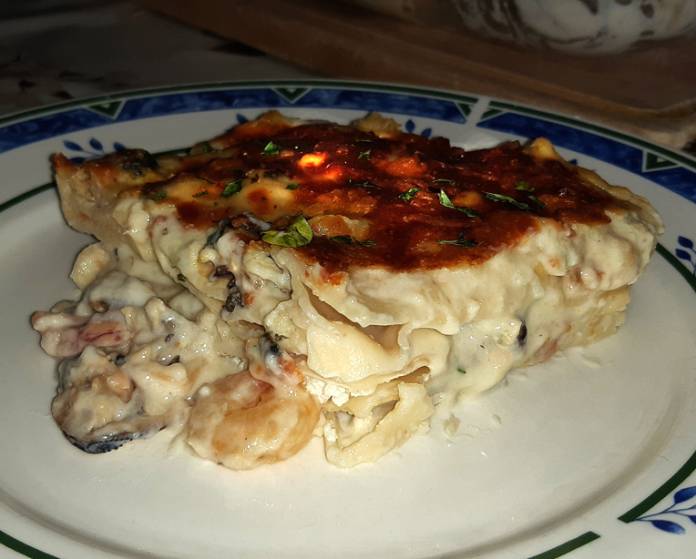 Ravjul il-forn biz-zalza bajda tal-frott tal-baħar