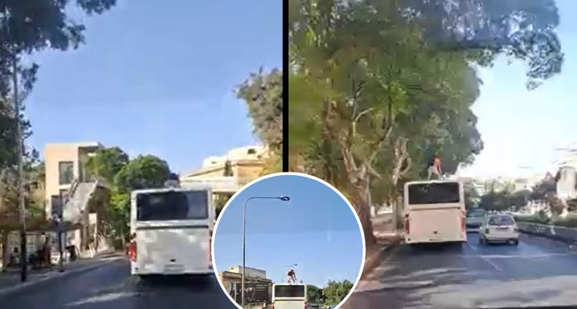 Raġel fuq saqaf ta' xarabank; irrappurtat lill-pulizija