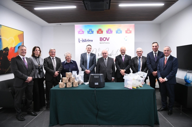 President visits l-Istrina BOV Piggy Bank campaign coin counting process