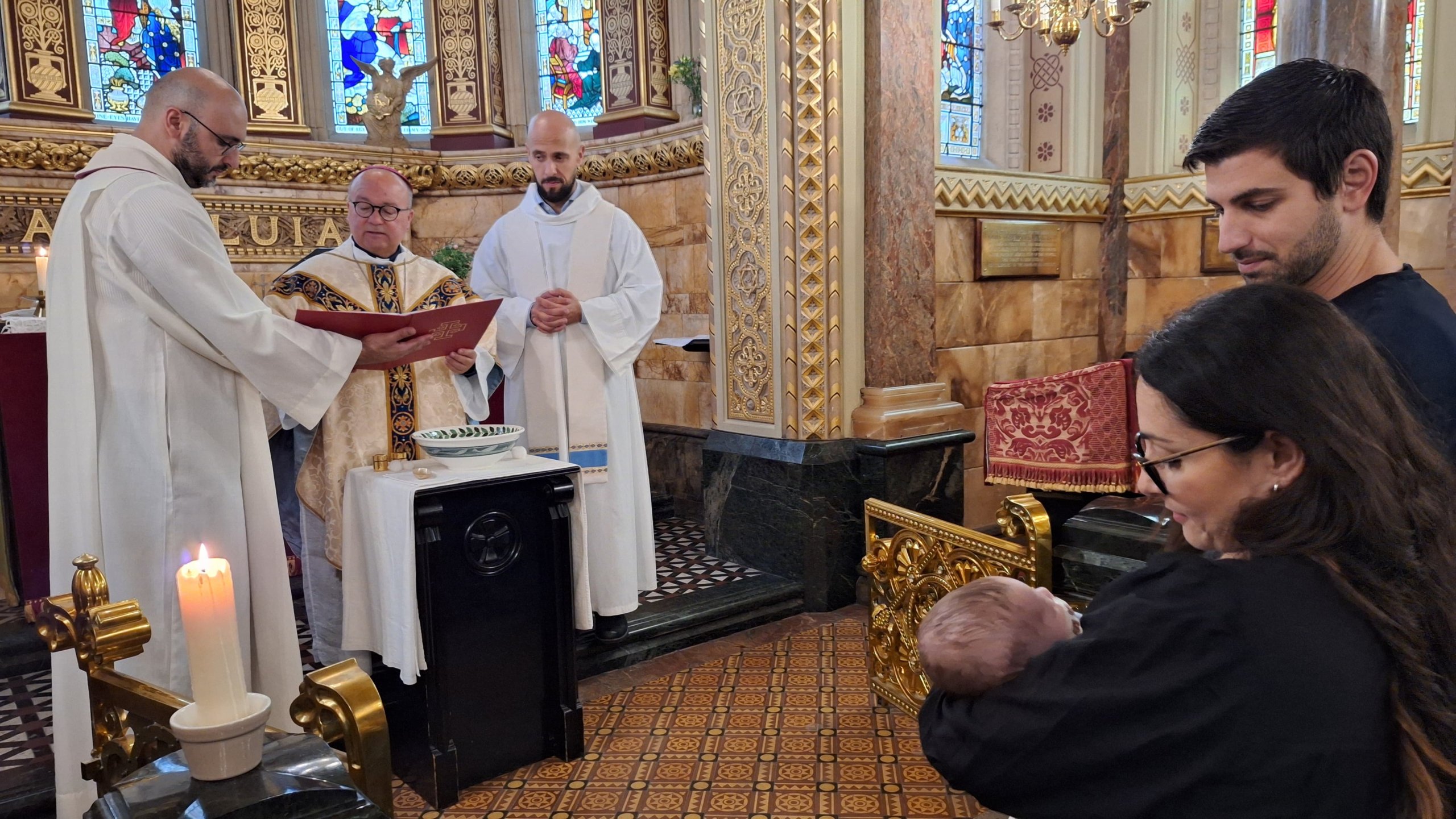 Archbishop Scicluna baptises baby and offers support during London visit