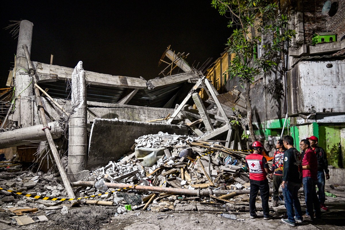 Indonesia school collapse leaves dozens trapped and at least three dead