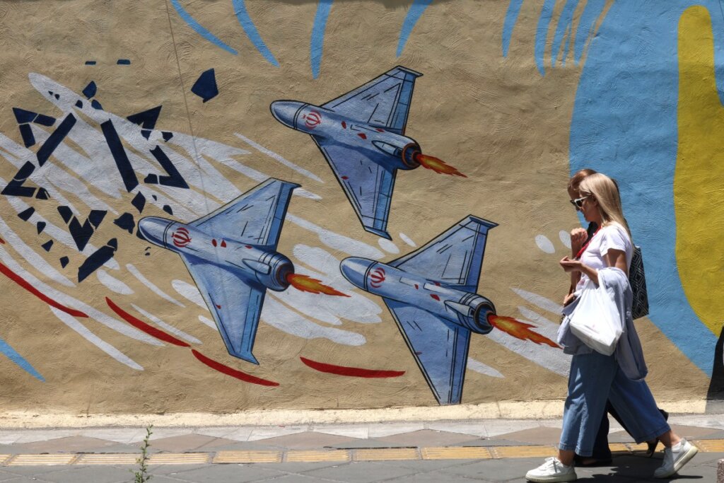 Iran halts military operations but warns of harsher response to future ...